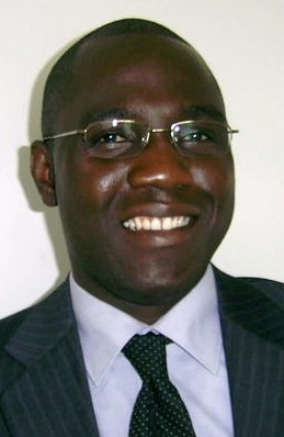 Robert Badou Koffi — Pluricom